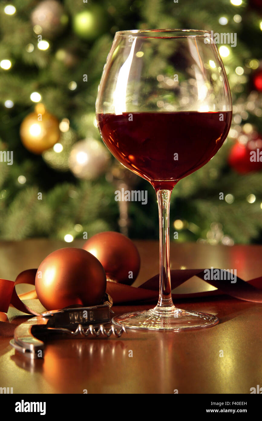 Glass of red wine on table Stock Photo - Alamy
