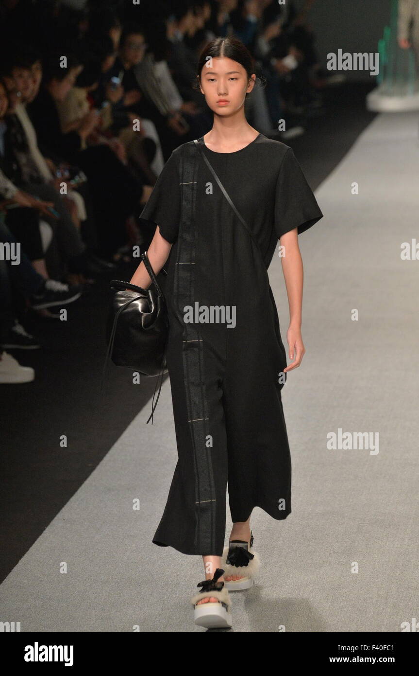 Shanghai. 13th Oct, 2015. A model shows a creation of fashion designer ...