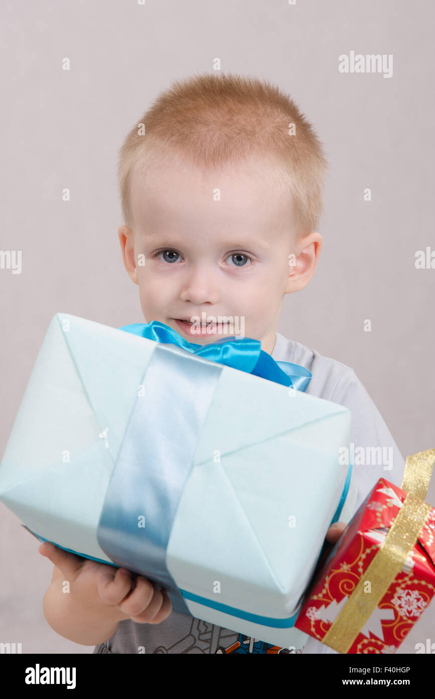 Boy with big gift Stock Photo - Alamy