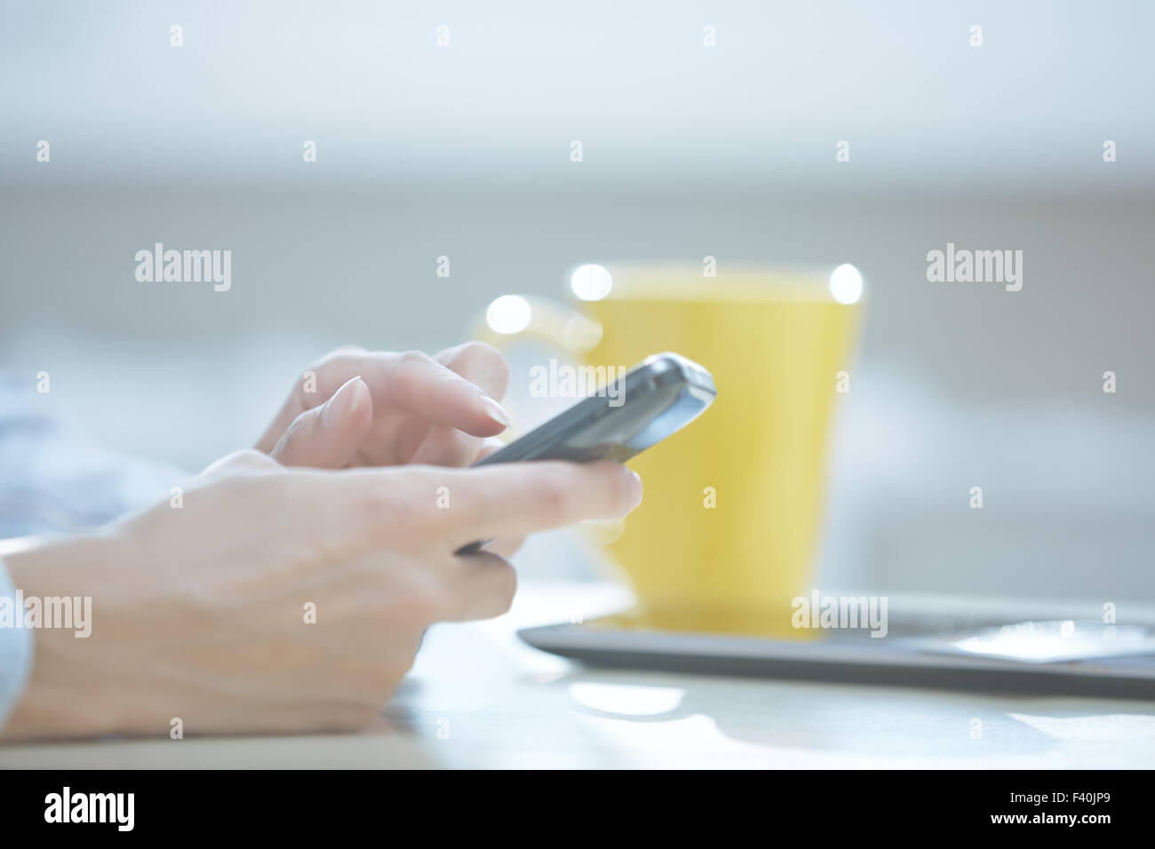 Hands of smartphone user Stock Photo - Alamy