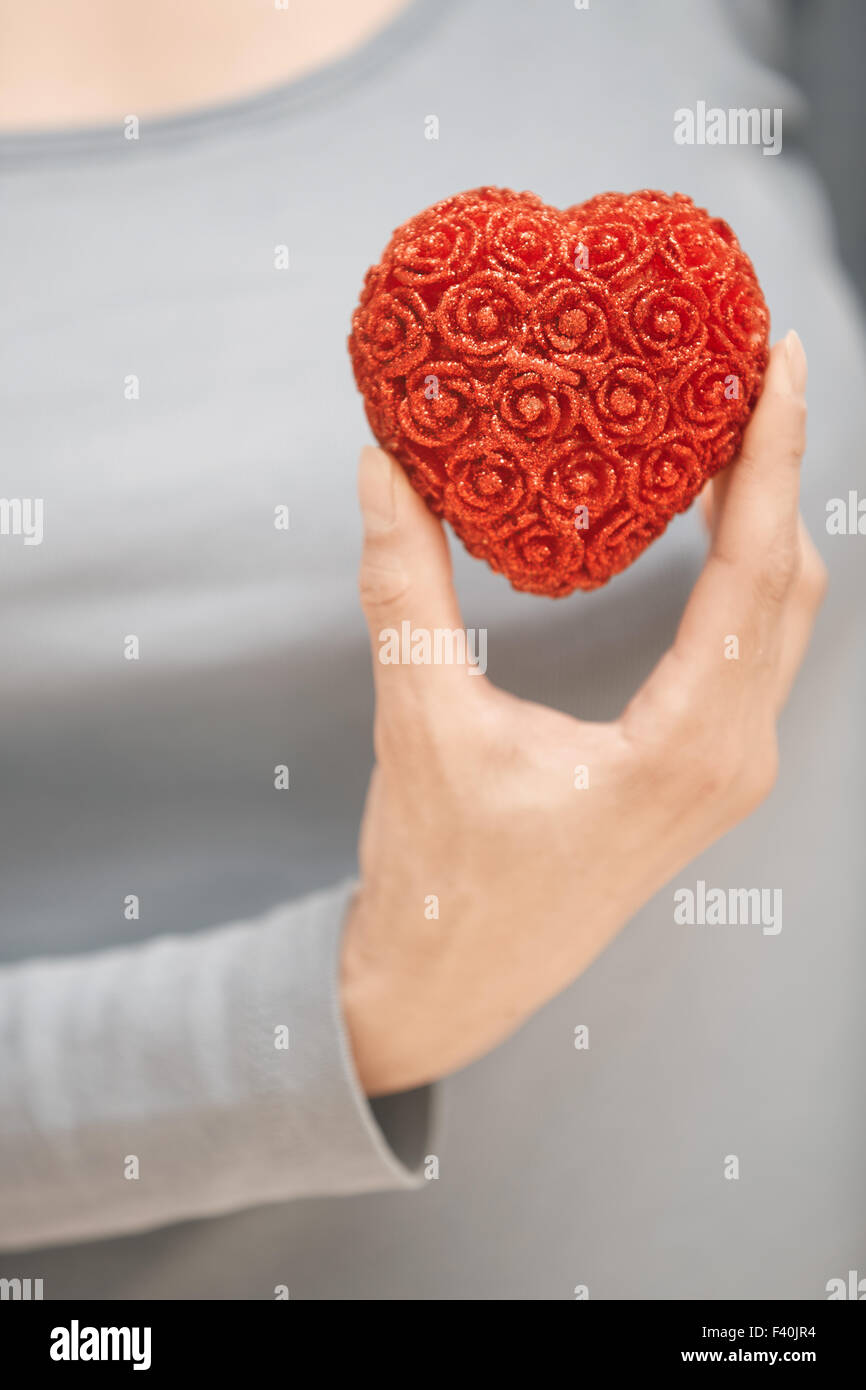Heart in hand Stock Photo - Alamy