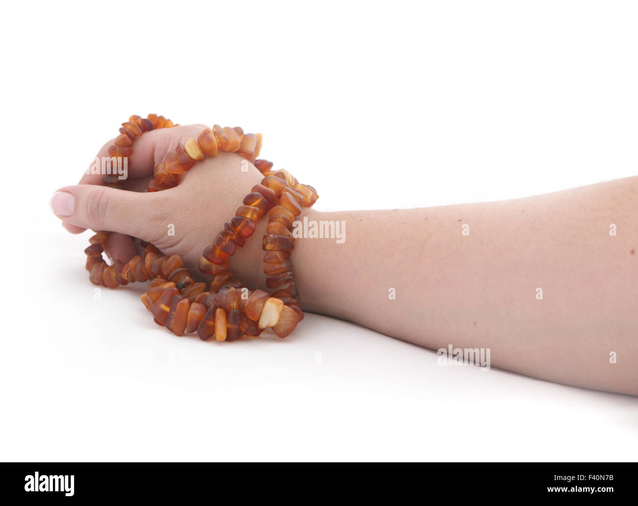 Hand and amber hi-res stock photography and images - Alamy