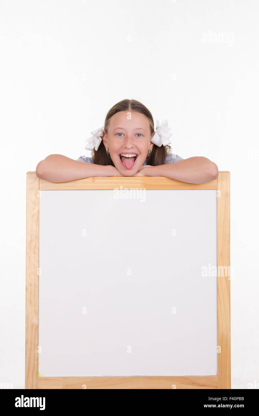 Teen girl with an advertising stand Stock Photo - Alamy