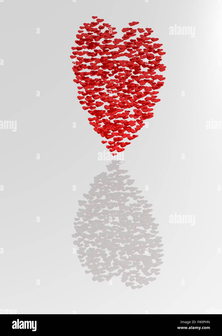 Red heart shape made of small hearts Stock Photo - Alamy