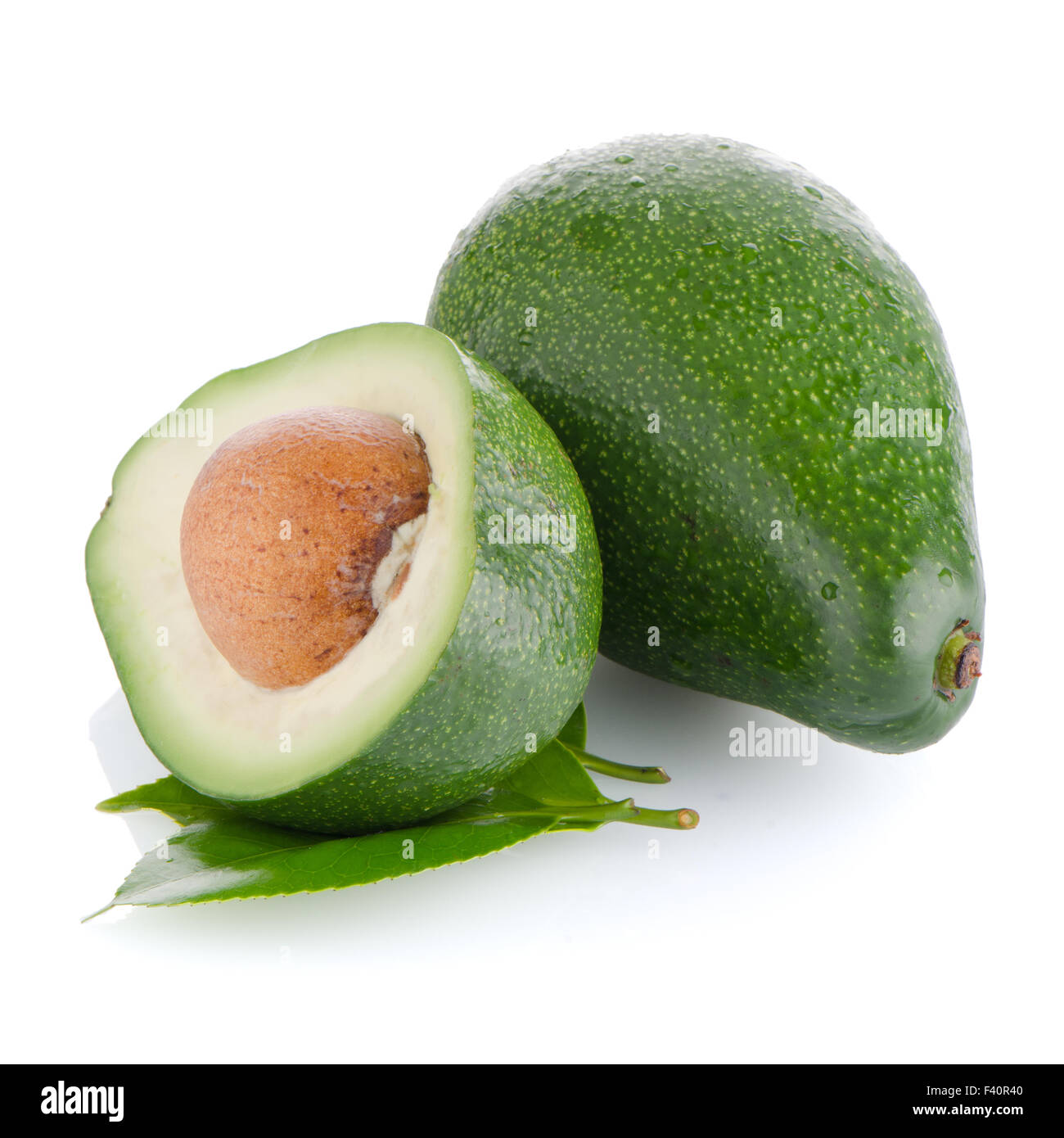 Avocado fruits on white background Stock Photo - Alamy
