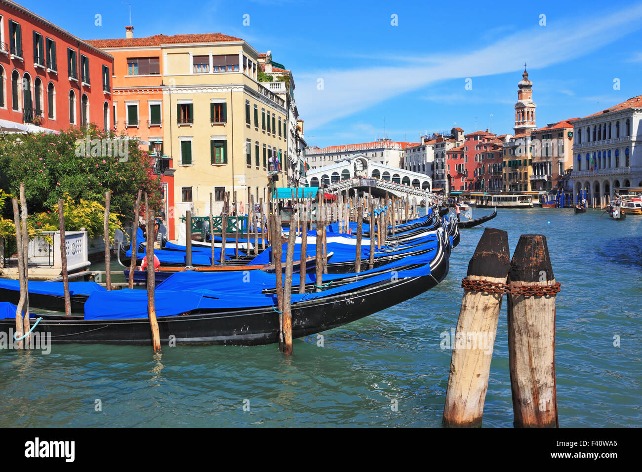 Graceful black gondolas wait for passengers Stock Photo - Alamy