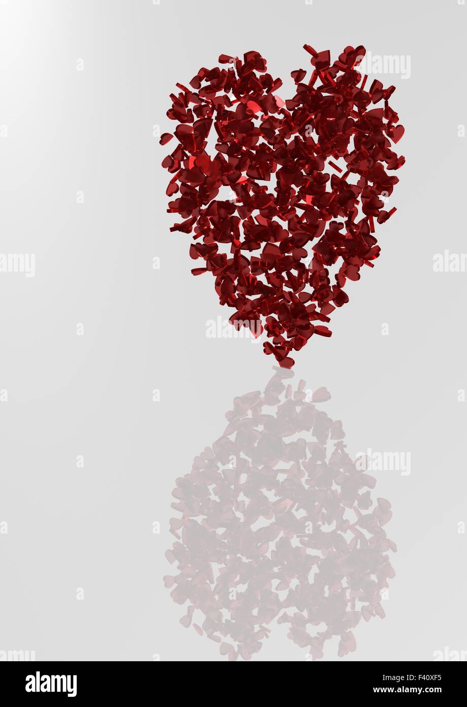 Red heart shape made of small hearts Stock Photo - Alamy
