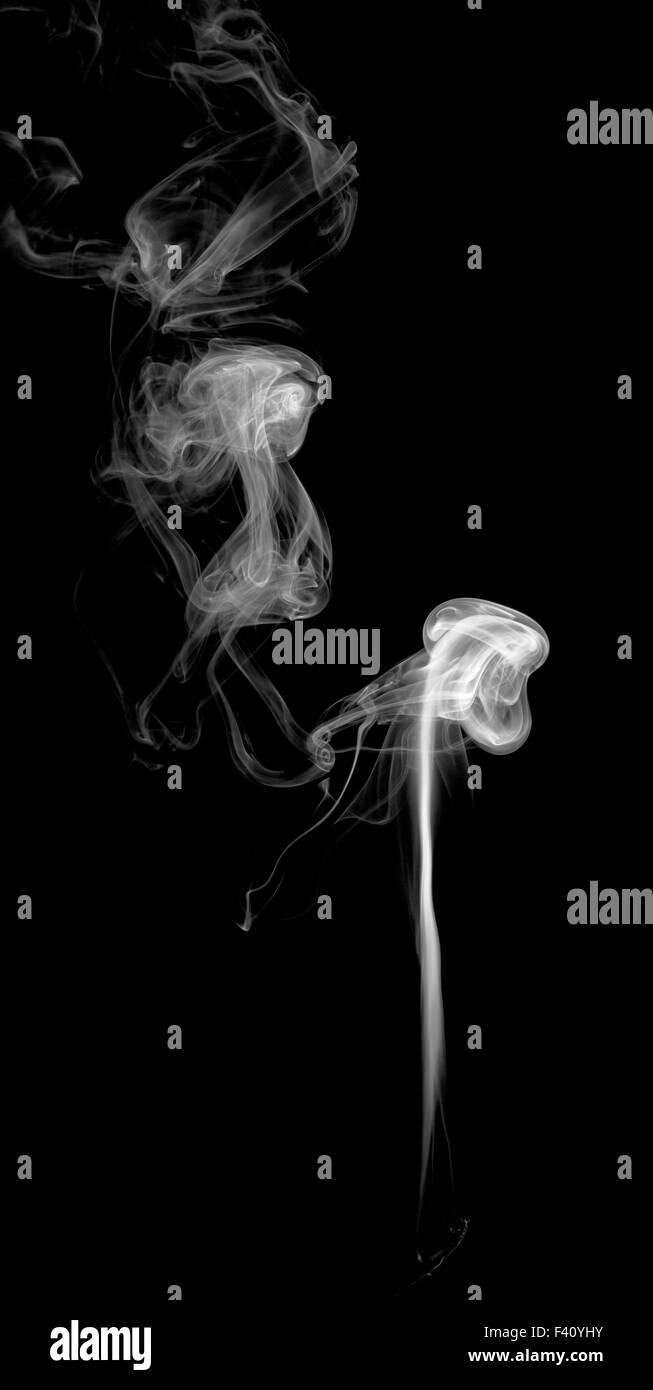 Abstract light smoke on a dark background Stock Photo - Alamy