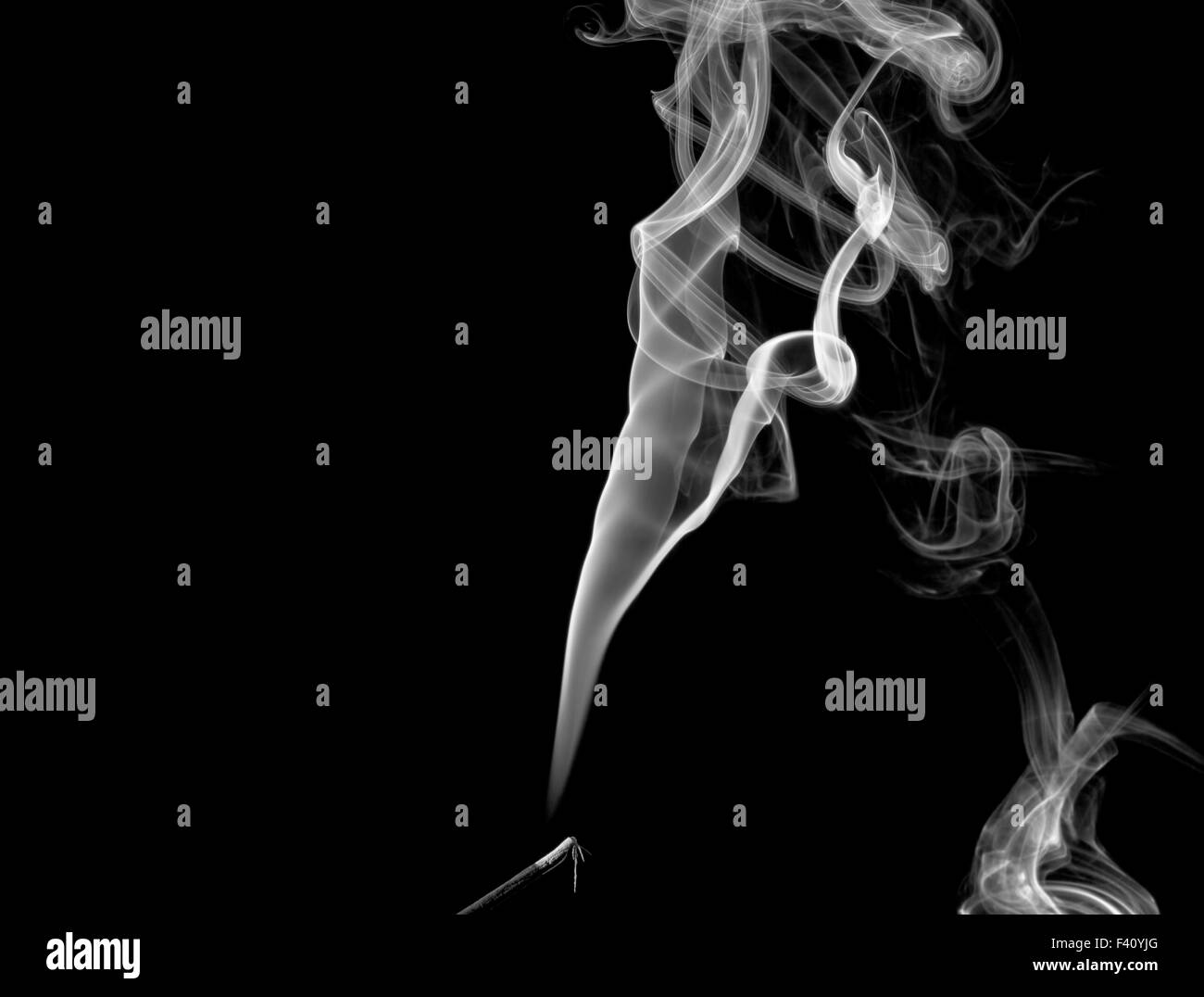Abstract light smoke on a dark background Stock Photo - Alamy