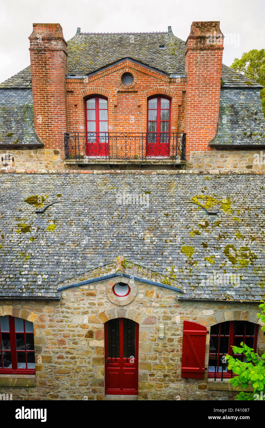 House with red doors, Mont Saint-Michel, Normandy, France Stock Photo ...