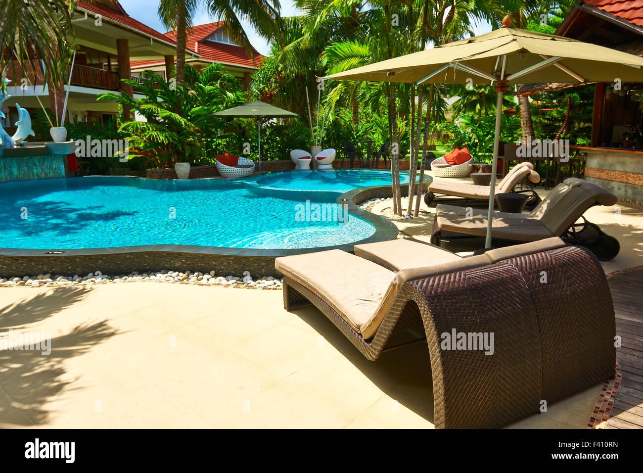 Luxury poolside area Stock Photo - Alamy