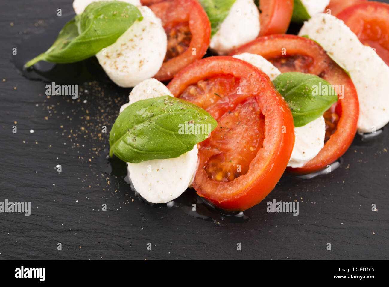 Caprese salad with mozzarella, tomato, basil and balsamic vinegar ...