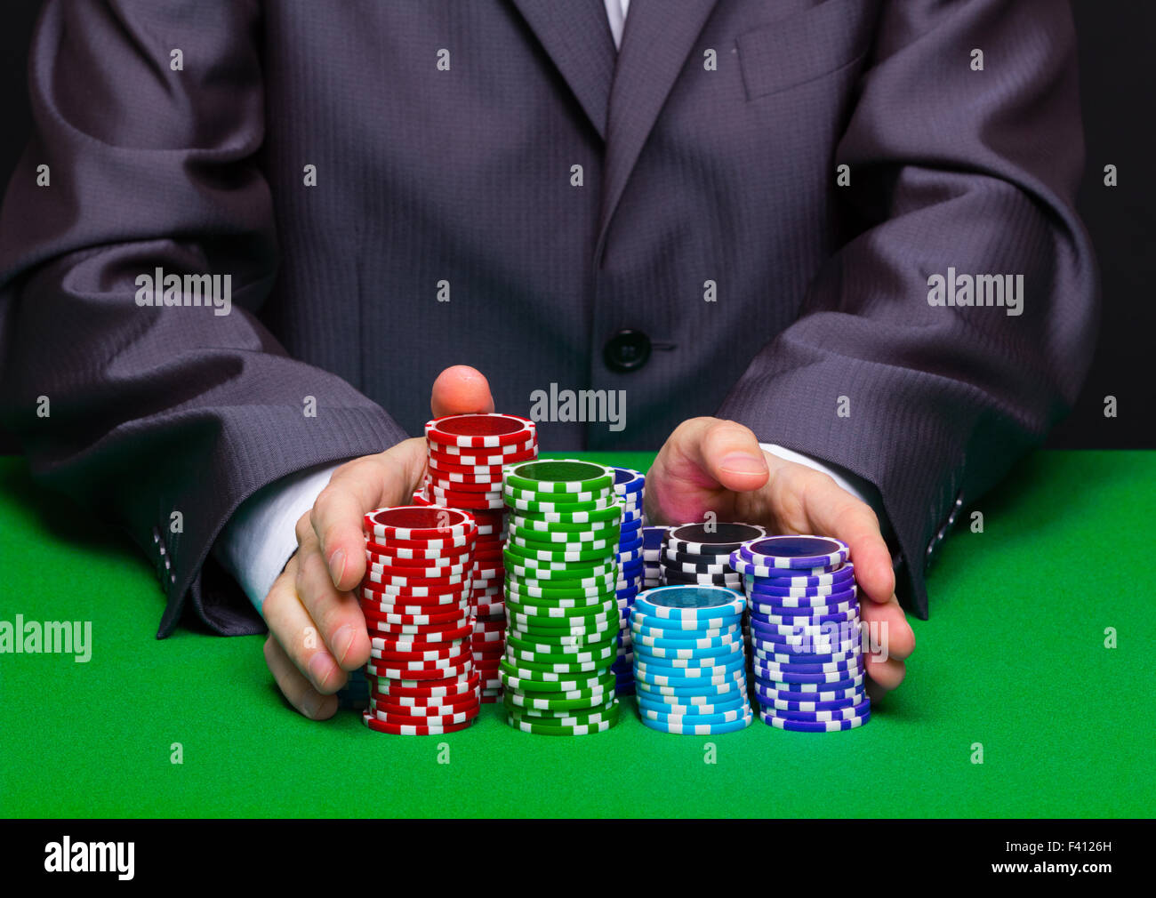 Poker hand man hi-res stock photography and images - Alamy