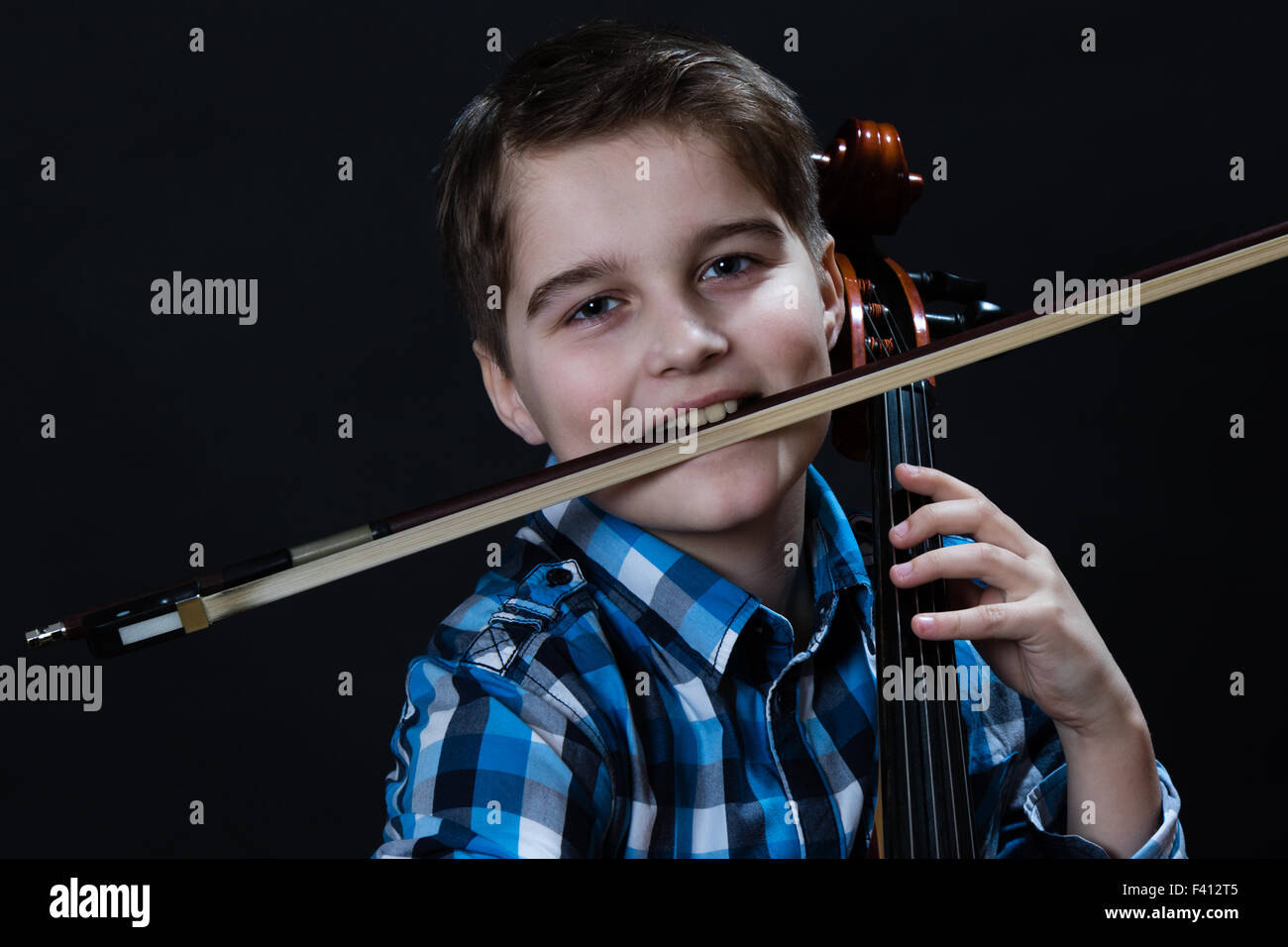 cellist with fiddlestick Stock Photo - Alamy