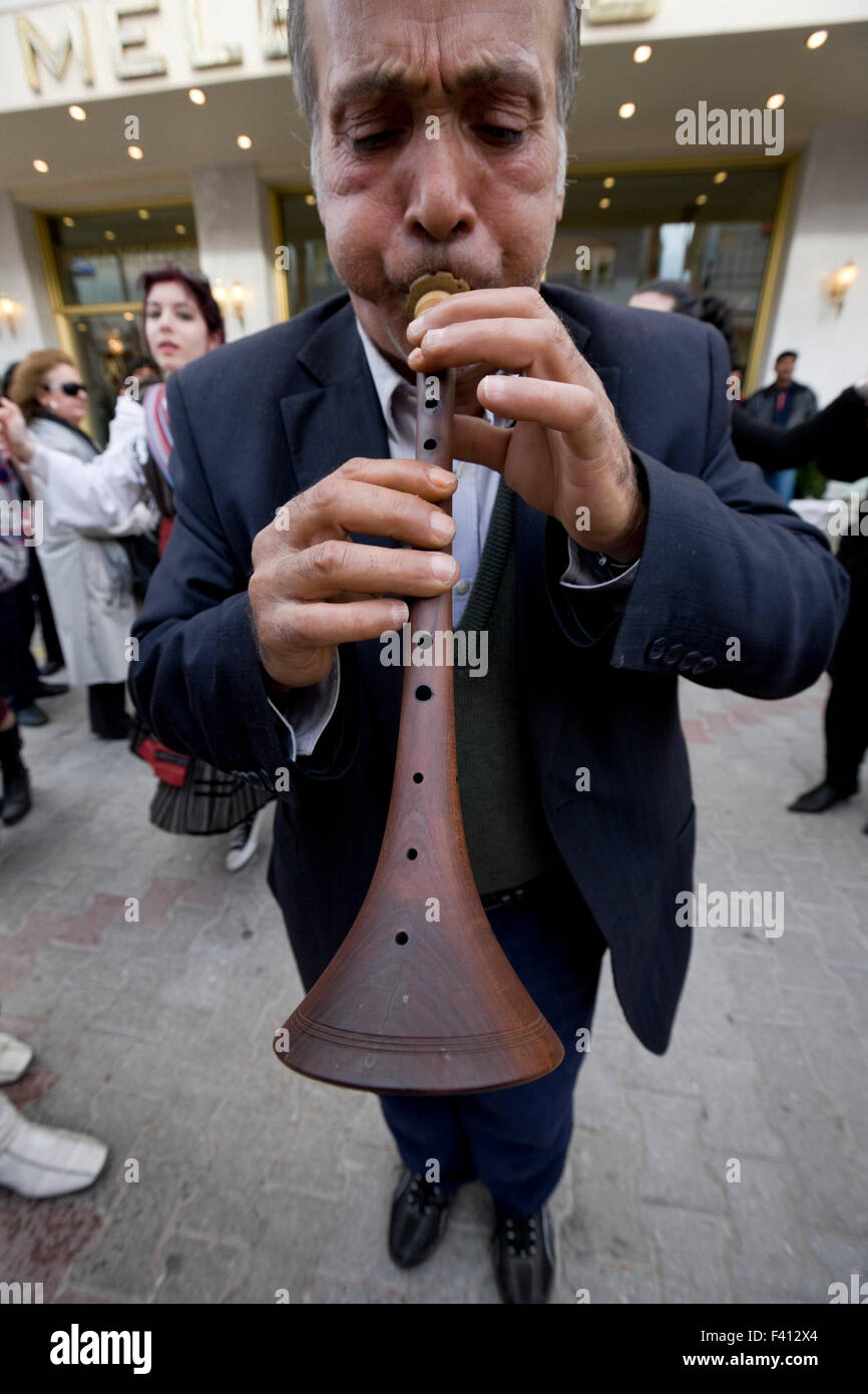 Closeup of a pipiza or zurna musical organ played in the hands of a ...