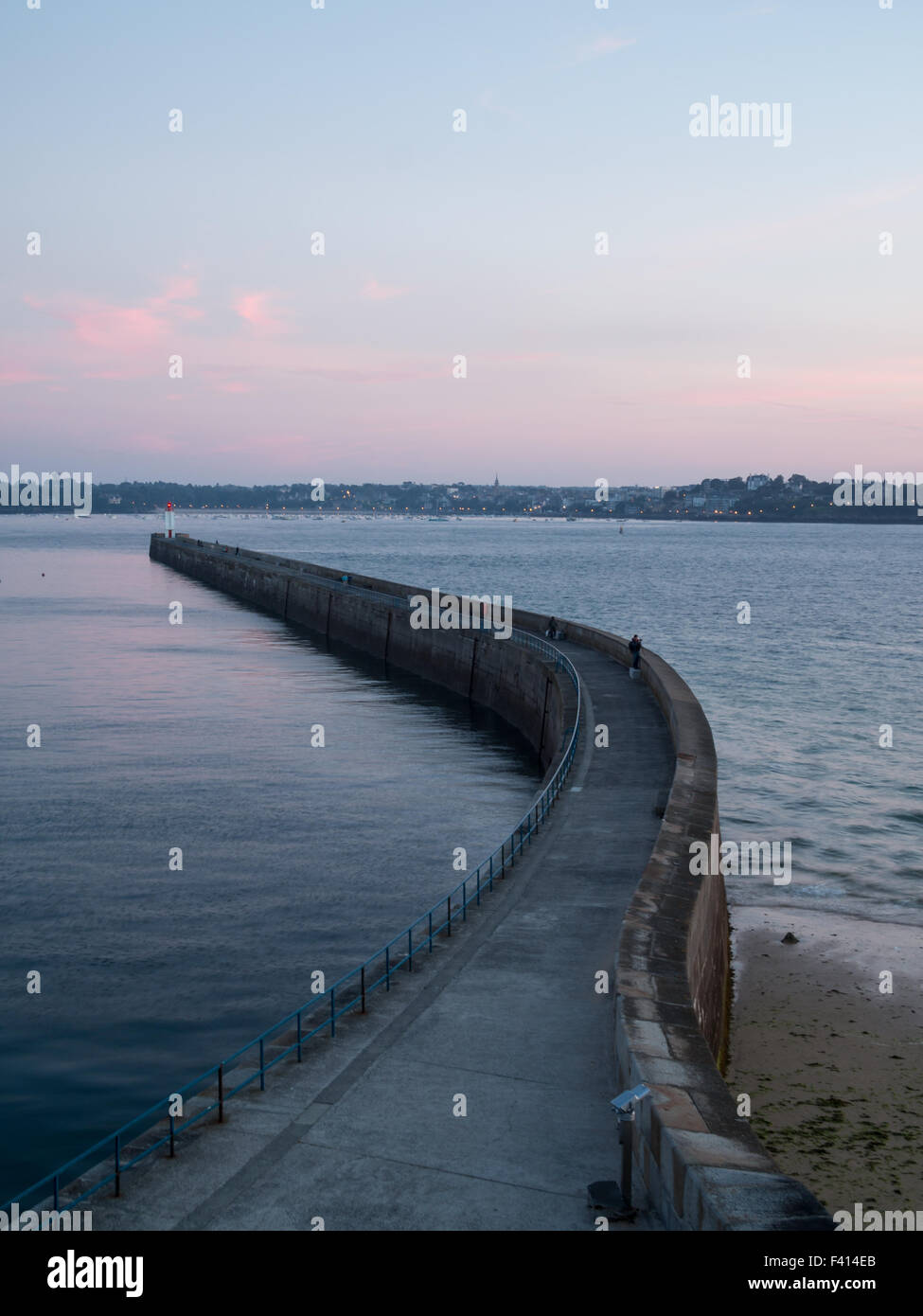 Saint-Malo port jetty at sunset Stock Photo - Alamy