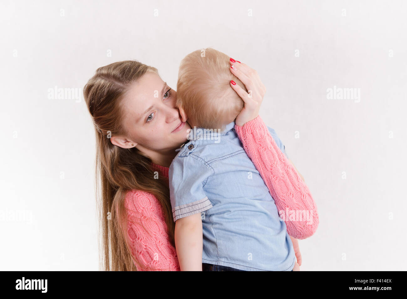 Young mother regrets her child Stock Photo - Alamy