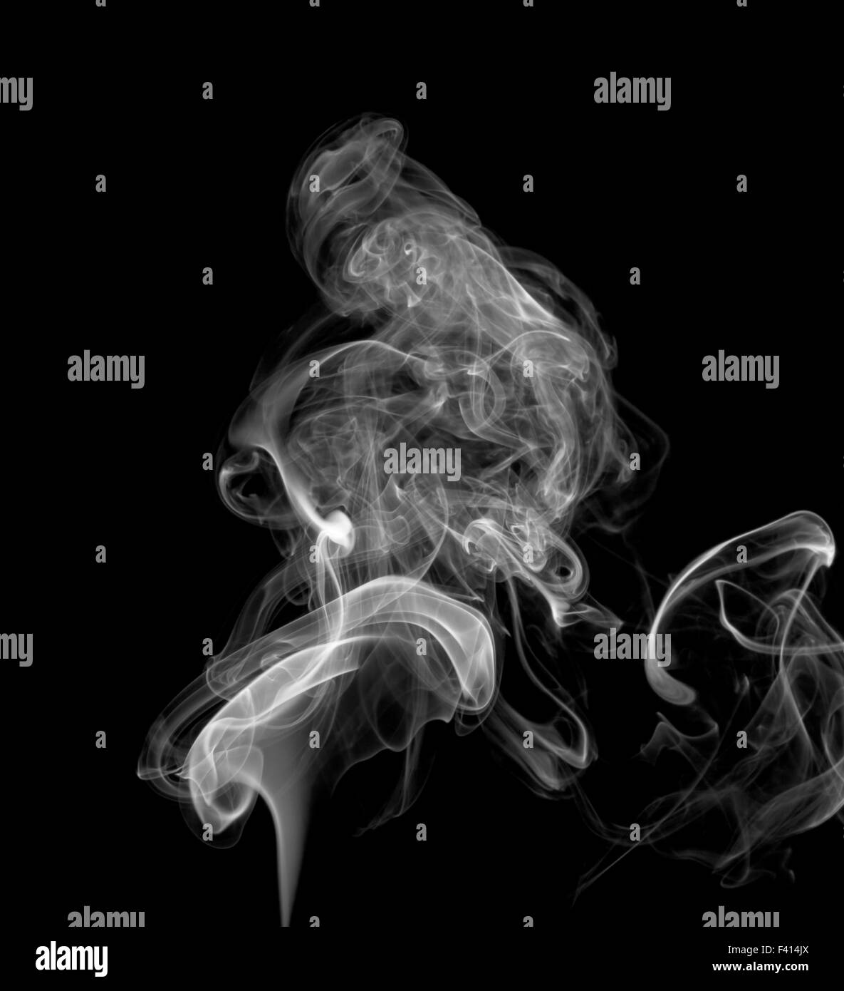 Abstract light smoke on a dark background Stock Photo - Alamy