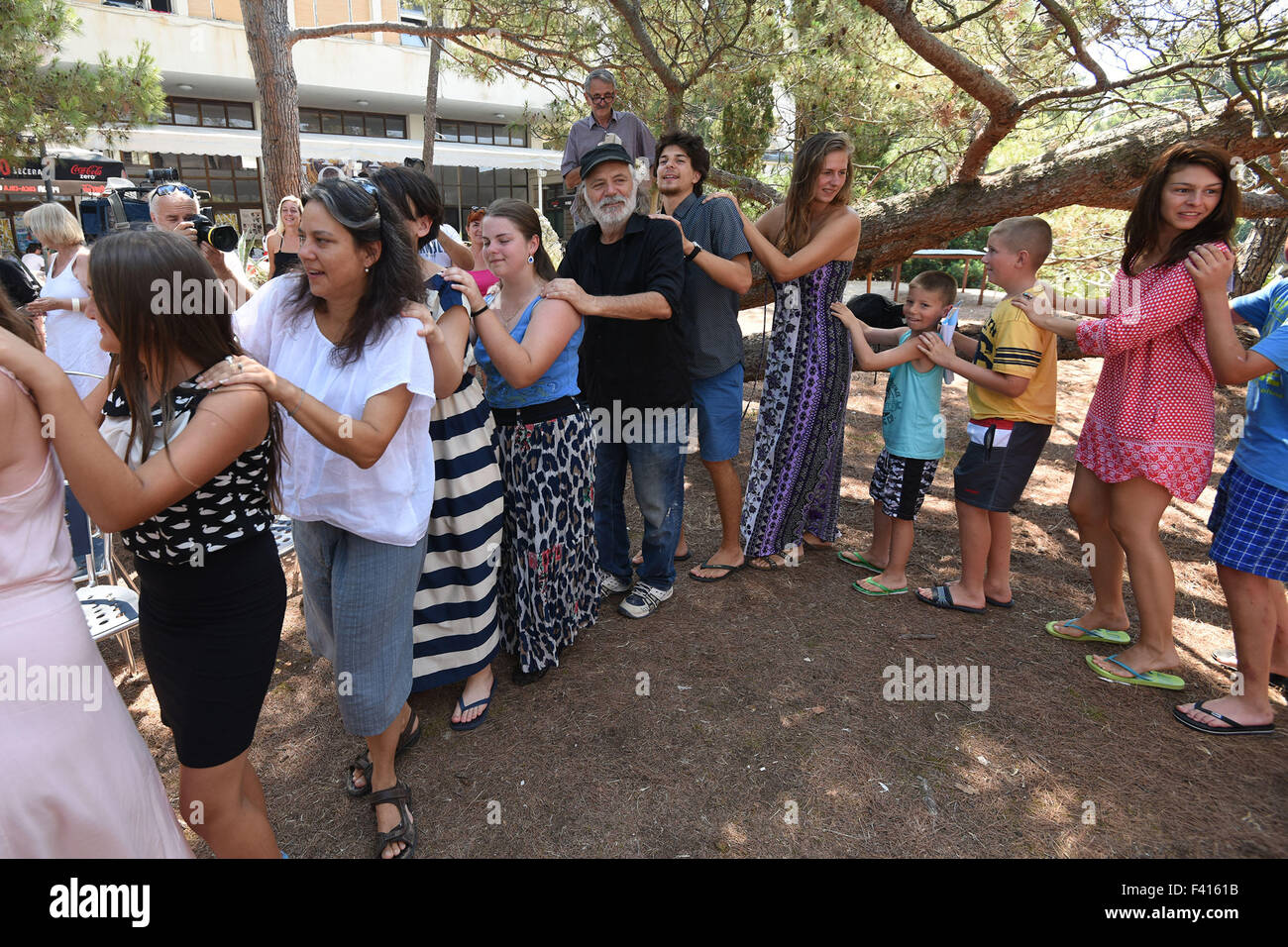 The famous professor and composer Nigel Osborne organizes a musical ...