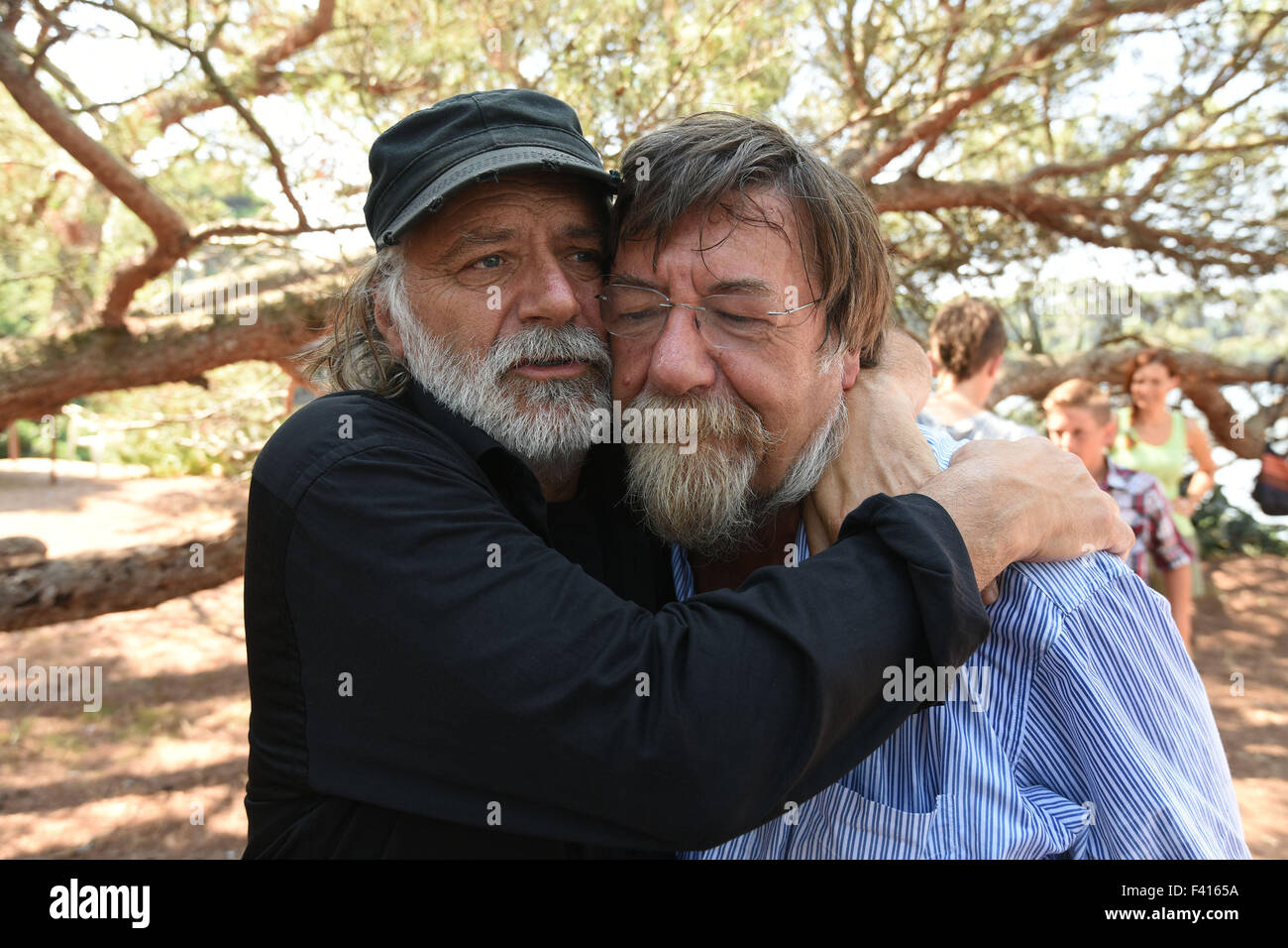 The famous professor and composer Nigel Osborne organizes a musical ...