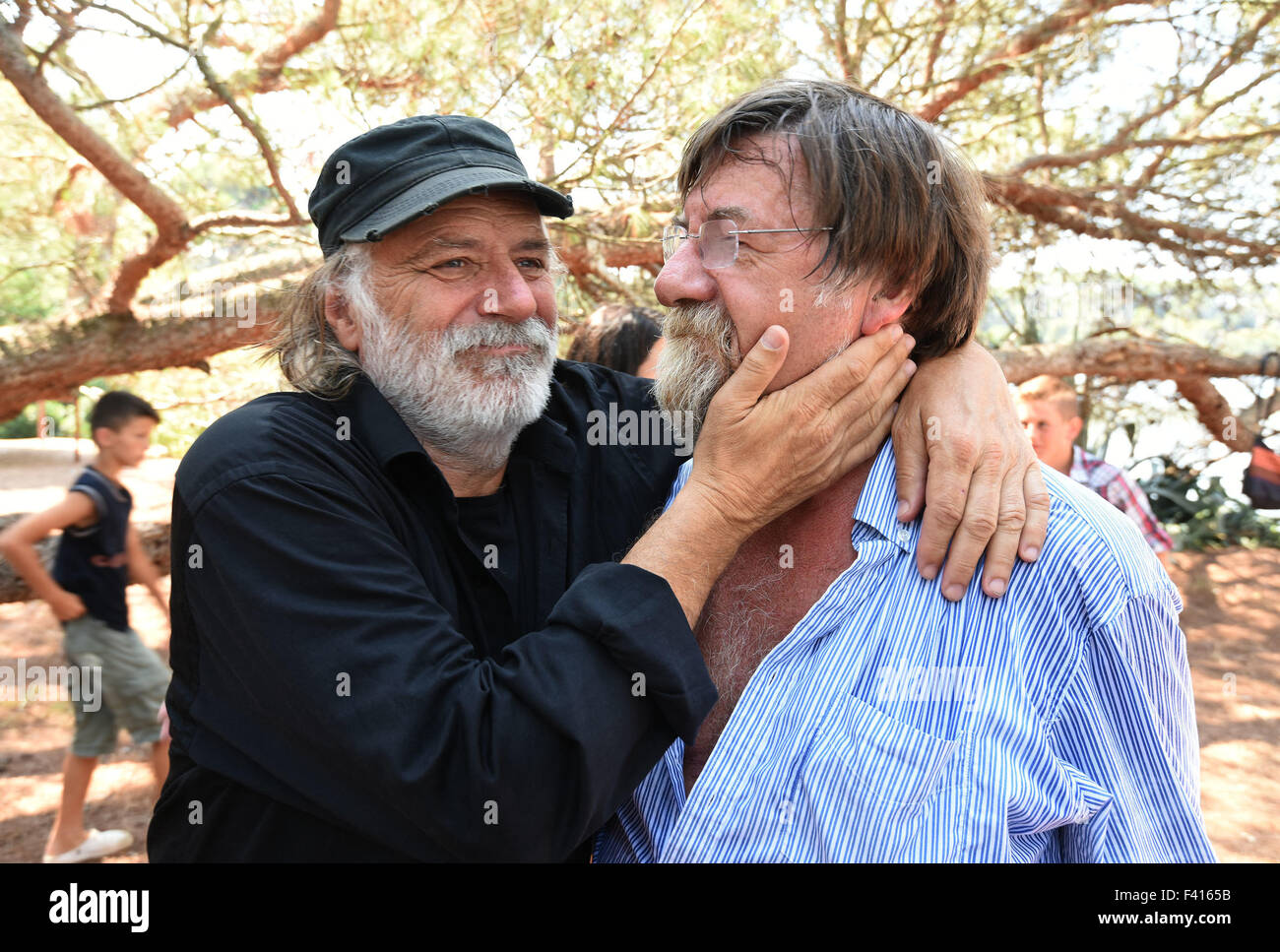 The famous professor and composer Nigel Osborne organizes a musical ...