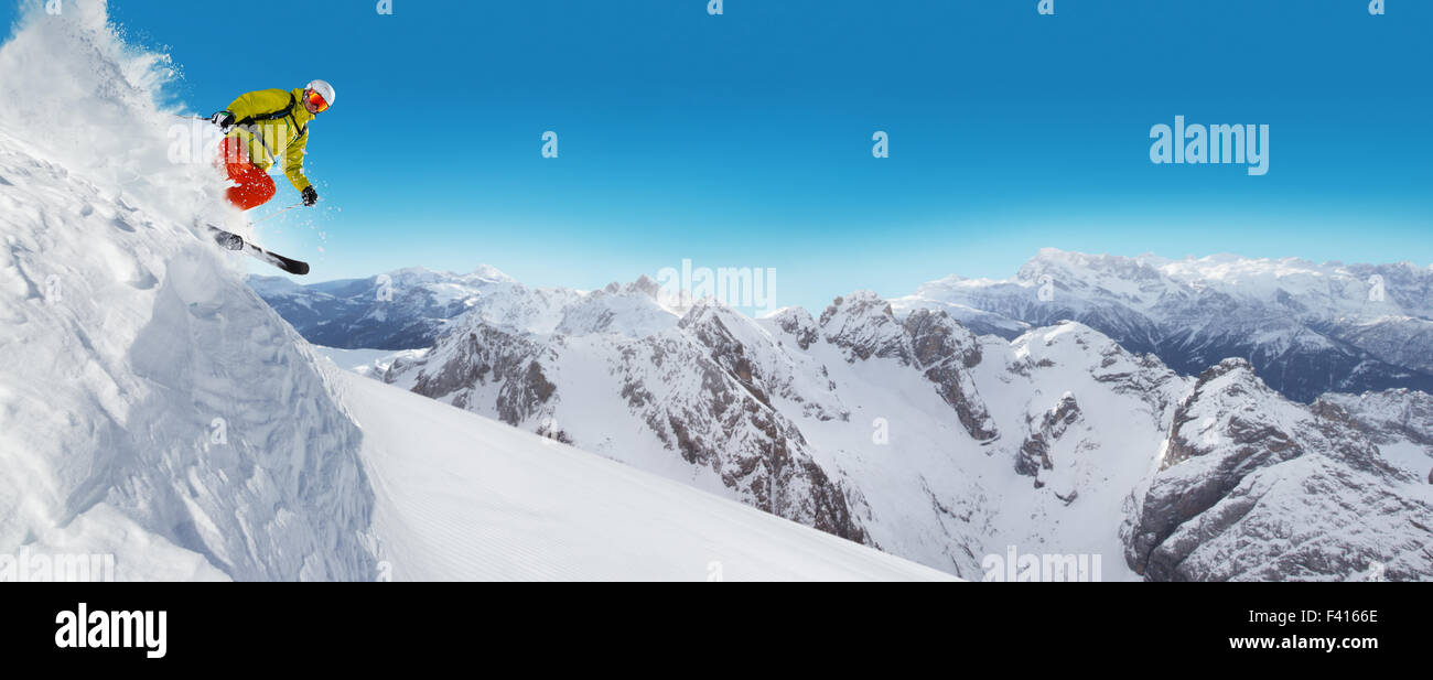 Jumping skier at jump Stock Photo - Alamy