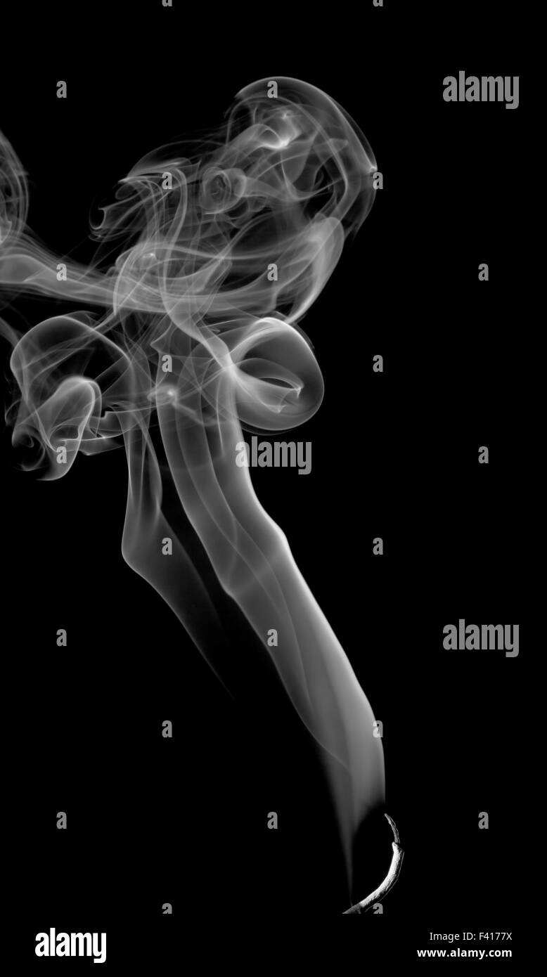 Abstract light smoke on a dark background Stock Photo - Alamy