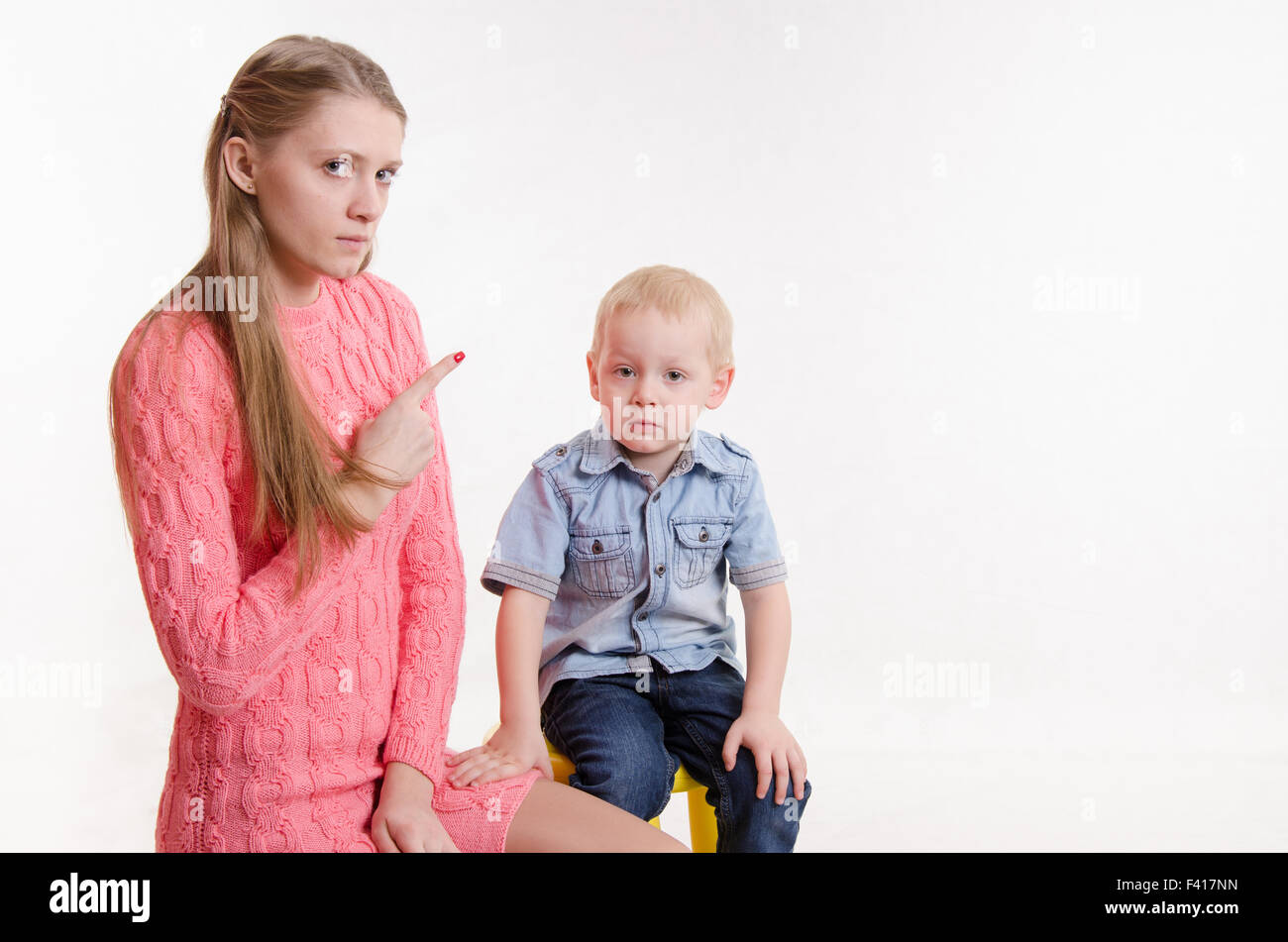 Mom scolds boy Stock Photo - Alamy
