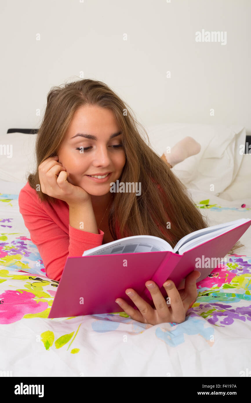 young woman reading her diary at home Stock Photo - Alamy
