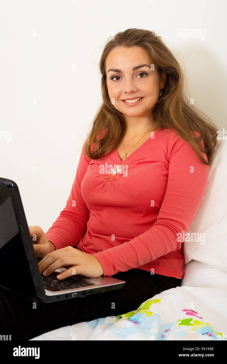 young woman using her laptop computer at home Stock Photo - Alamy
