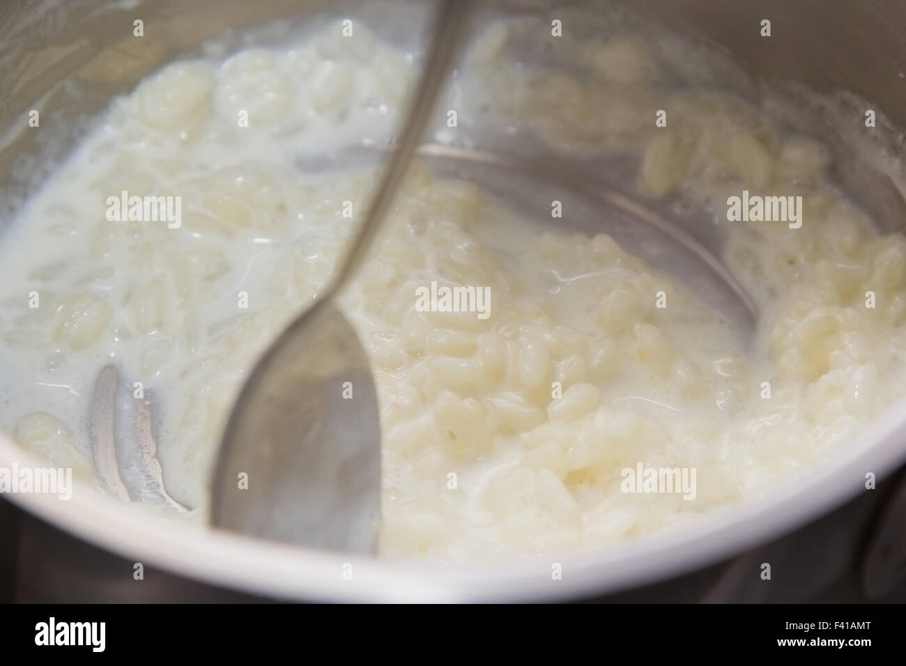 process risotto. Cooking on kitchen closeup Stock Photo - Alamy