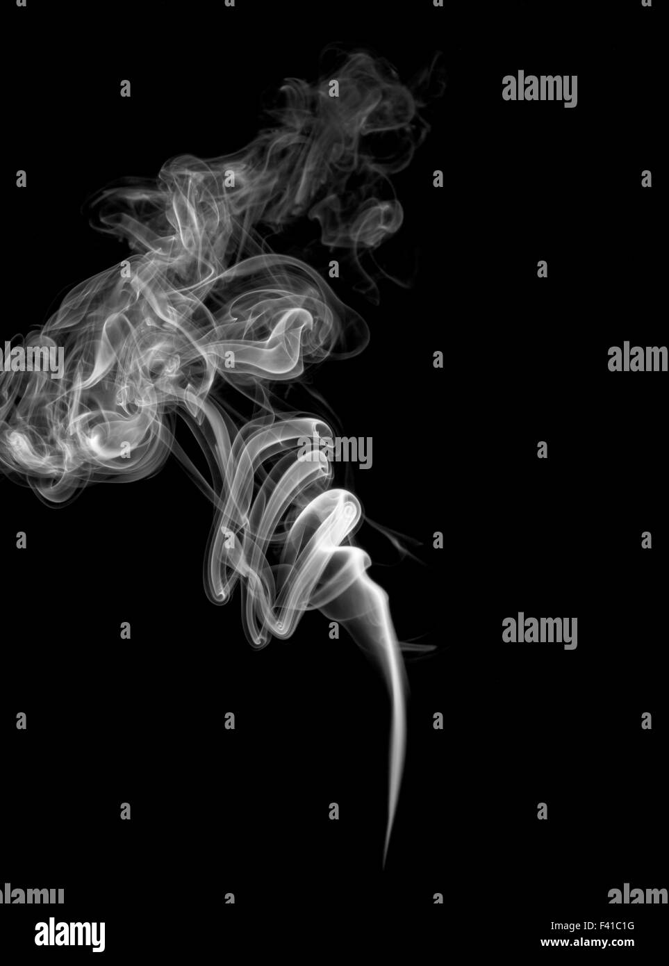 Abstract light smoke on a dark background Stock Photo - Alamy
