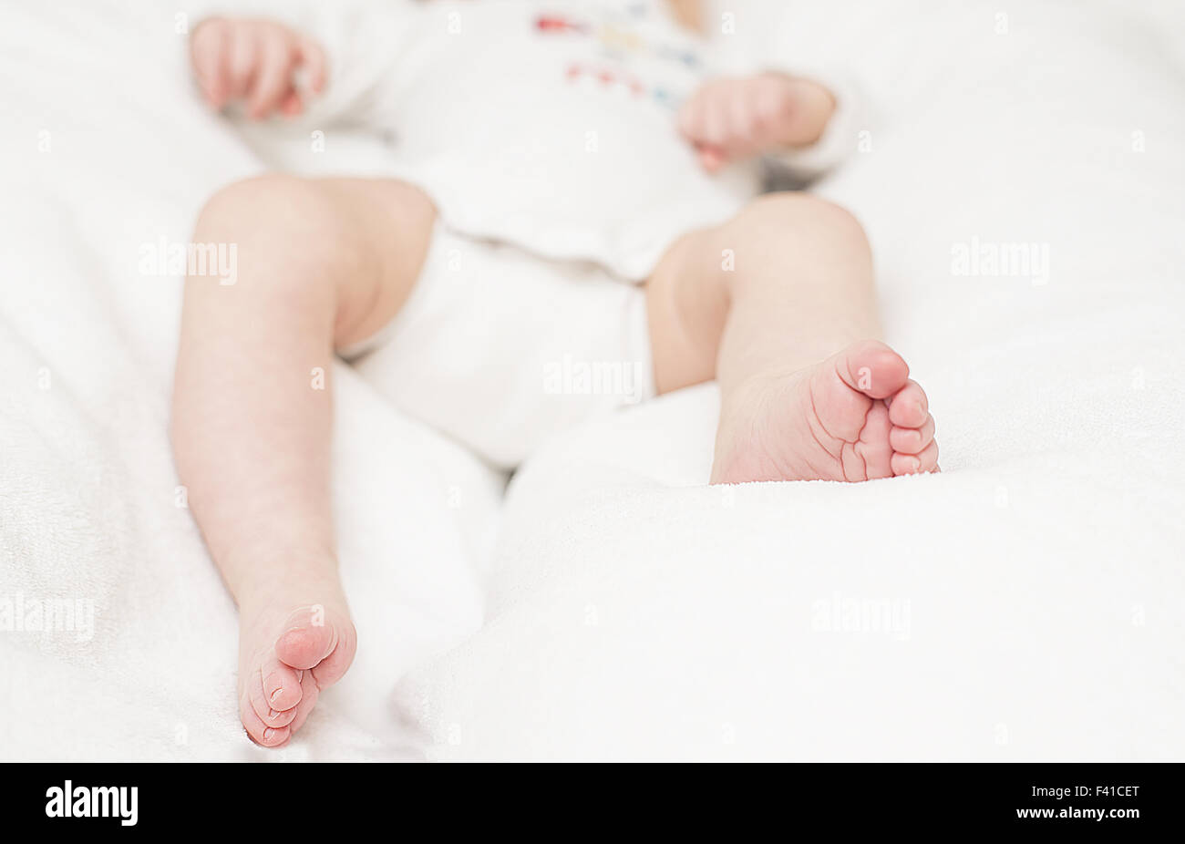 Baby lying happy hi-res stock photography and images - Alamy