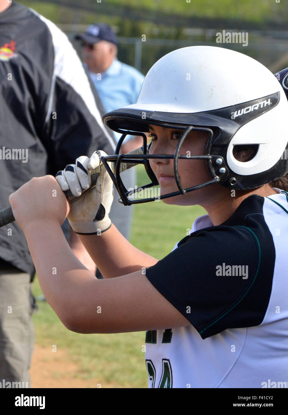 female batter in a high school softball game Stock Photo - Alamy