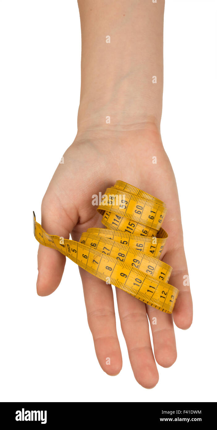 Humans arm holding tape measure, top view Stock Photo - Alamy