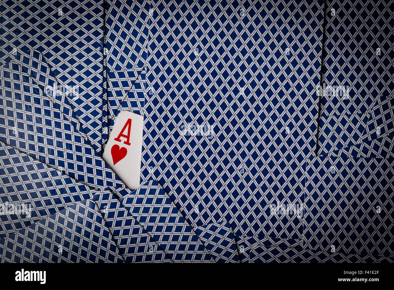 poker cards with ace of hearts showing Stock Photo - Alamy