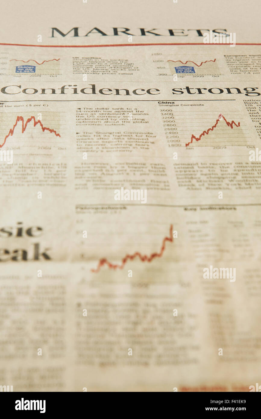 News paper Stock market financial charts showing slight growth with ...
