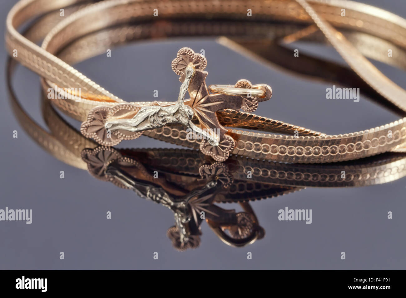 Gold Orthodox cross on a gold chain Stock Photo - Alamy