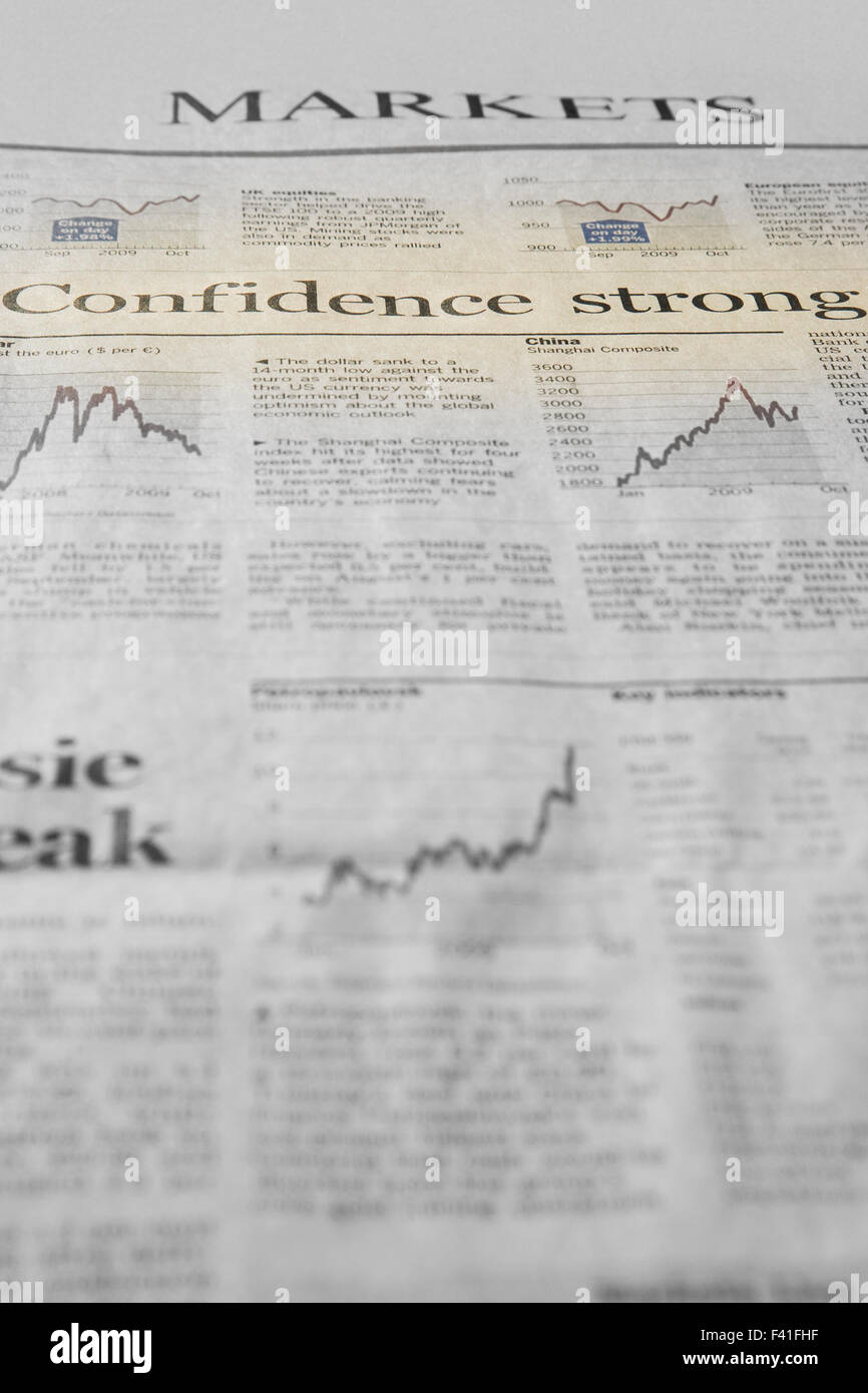 News paper Stock market financial charts showing slight growth with ...