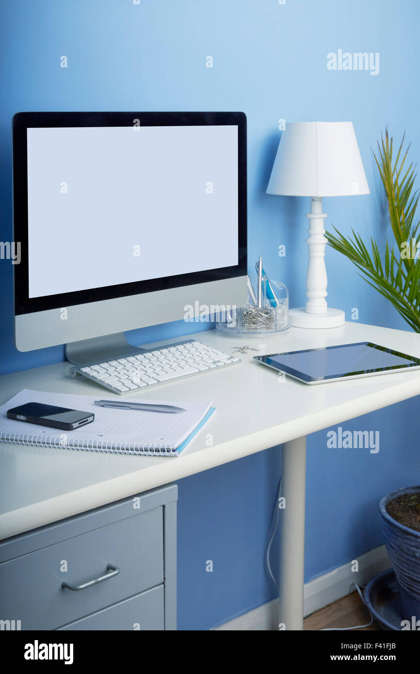 Home office interior set up with a blank computer screen to add copy ...