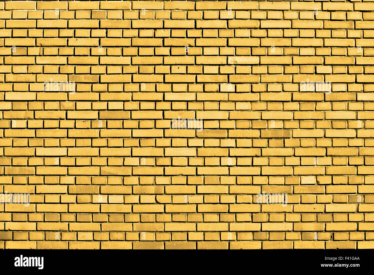 yellow brick wall background Stock Photo - Alamy