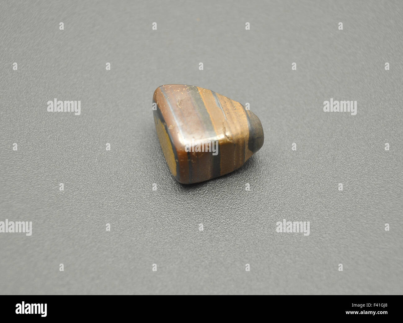 Detailed and colorful image of tiger iron mineral Stock Photo - Alamy