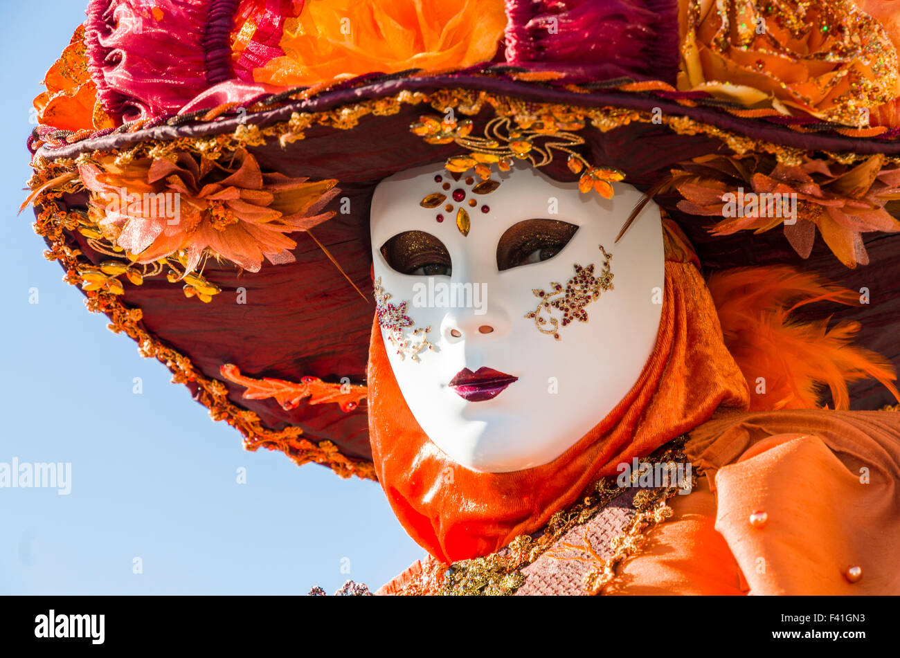 People are wearing imaginative venetian masks during the Carnevale ...