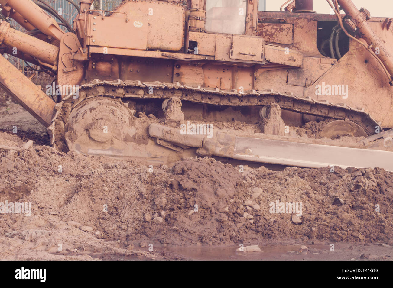 Old bulldozer track in mud and sand Stock Photo - Alamy