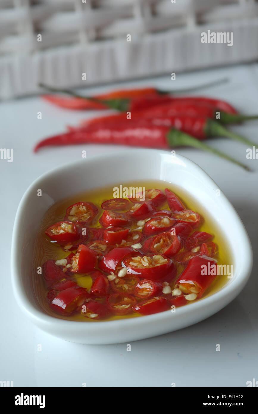 Chopped Chilis in Groundnut Oil Stock Photo - Alamy
