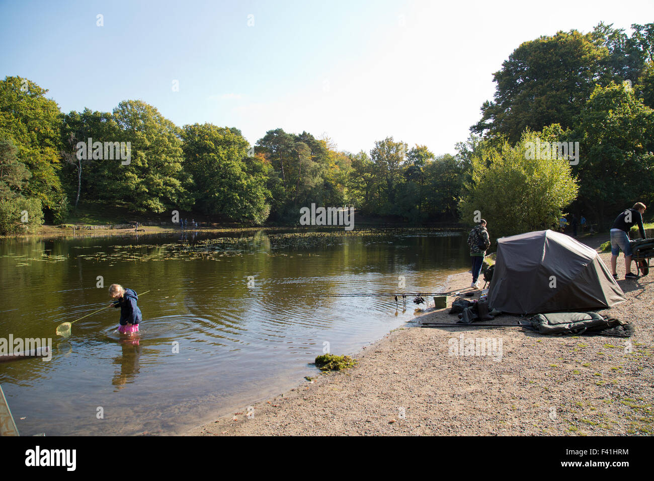Family fishing in the Autumn at Keston Ponds in the village of Keston ...