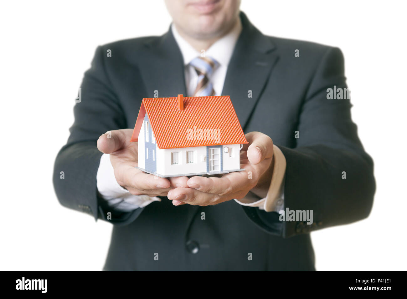 House with hands hi-res stock photography and images - Alamy