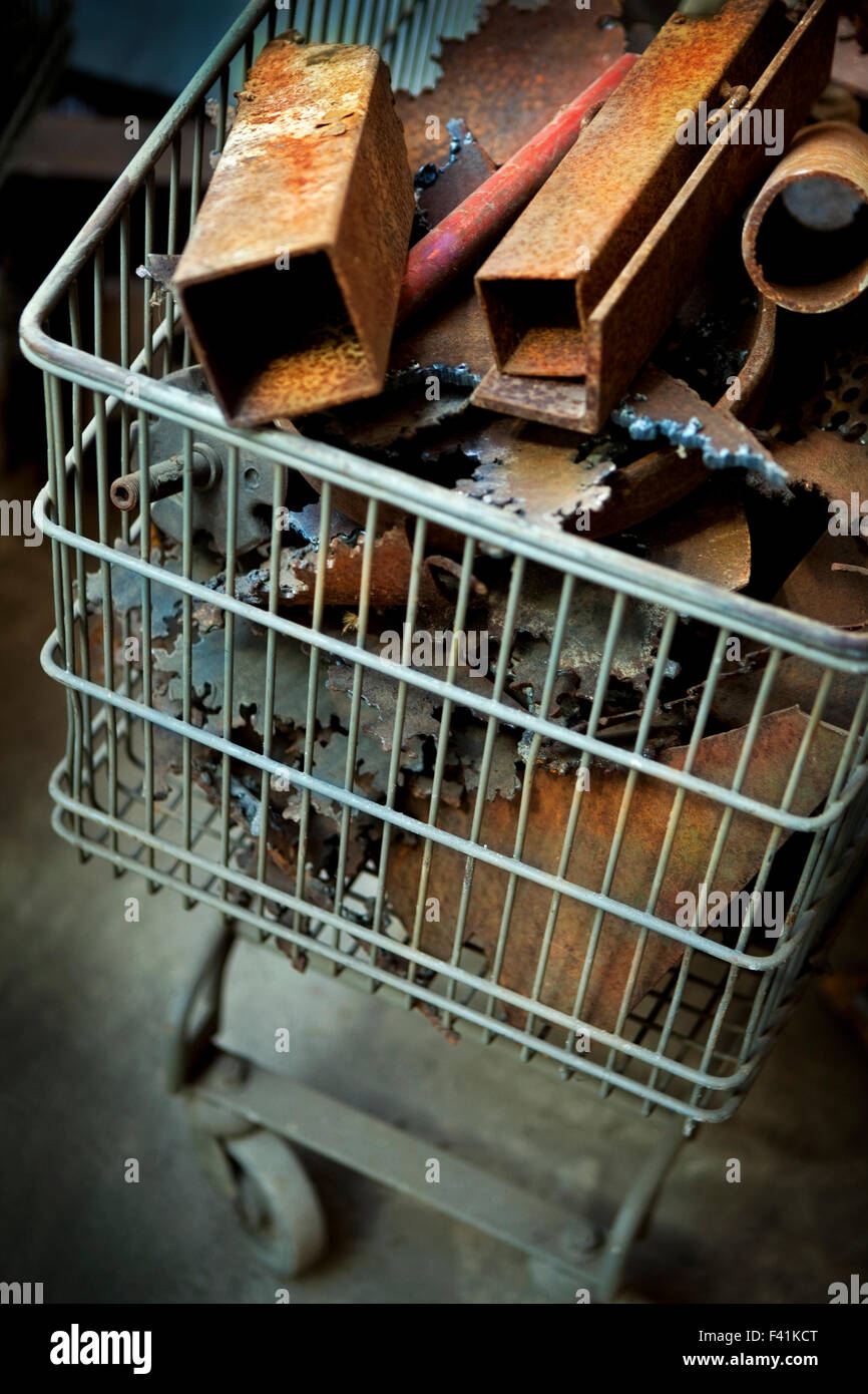 Parts and metal items in a shopping cart Stock Photo - Alamy