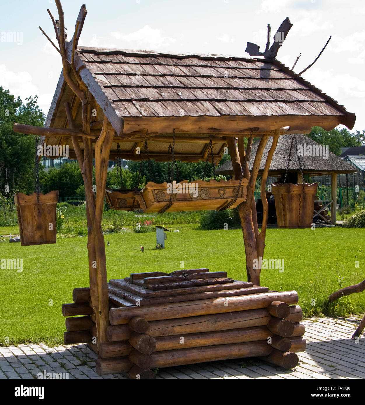 Exhibition of garden design, wooden draw well Stock Photo - Alamy