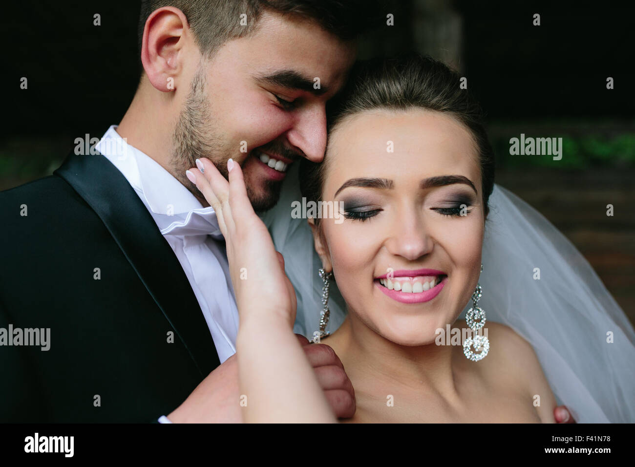 beautiful couple hugging outdoors in wooden hut, a close angle Stock ...